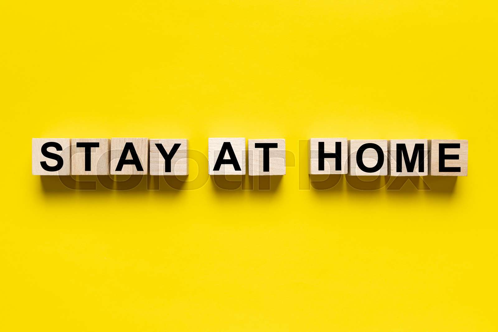 Stay at home text on wooden blocks | Stock image | Colourbox