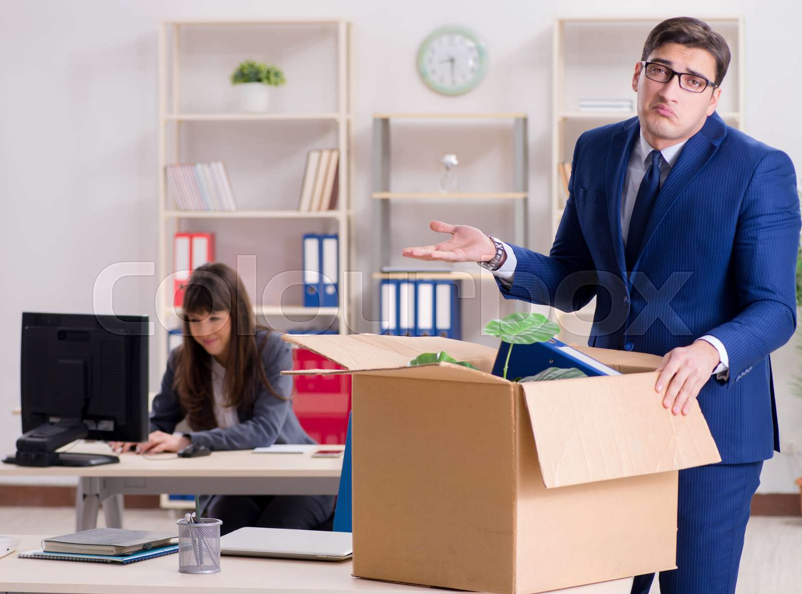 Person being fired from his work | Stock image | Colourbox