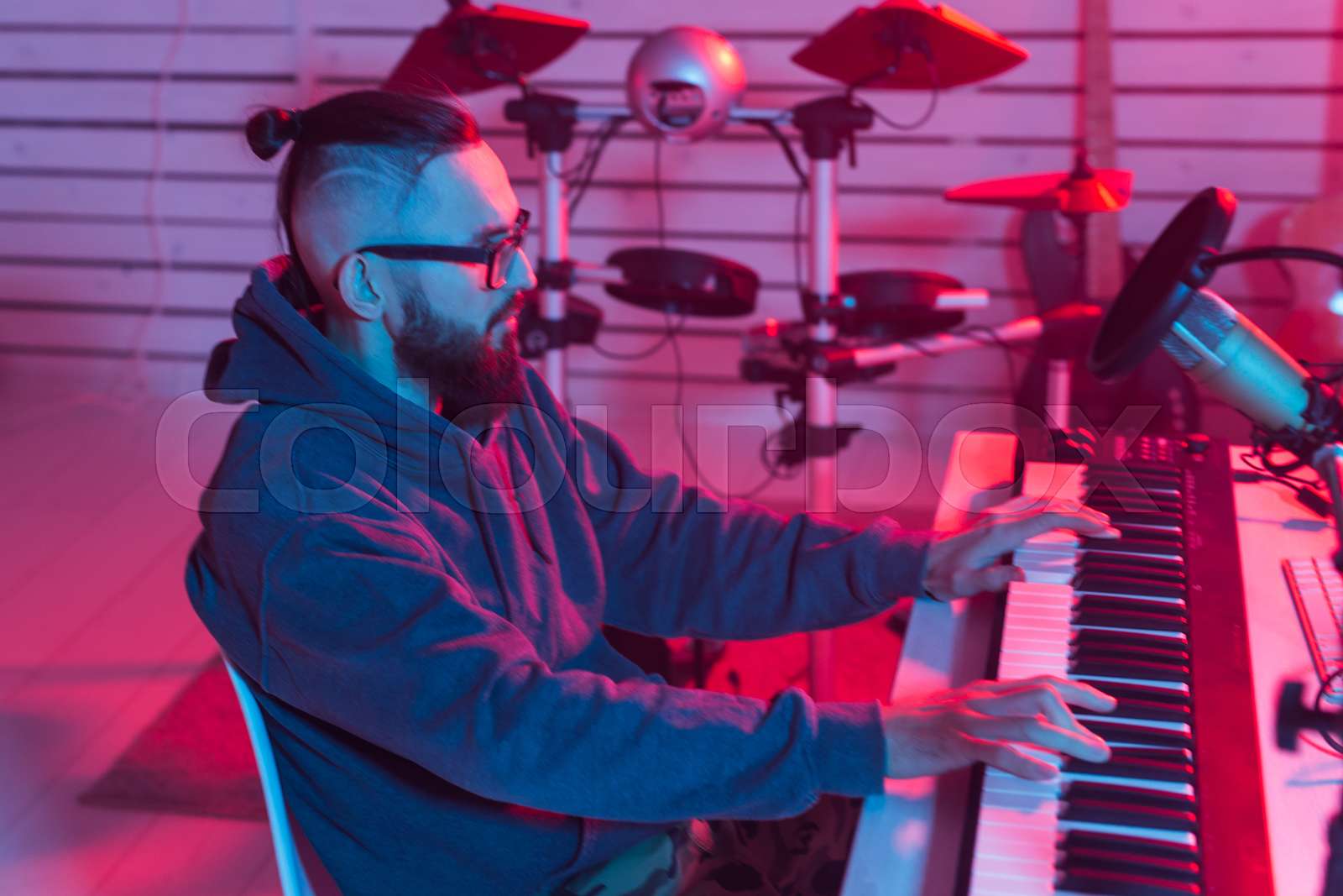 Male sound producer working in recording studio. | Stock image | Colourbox
