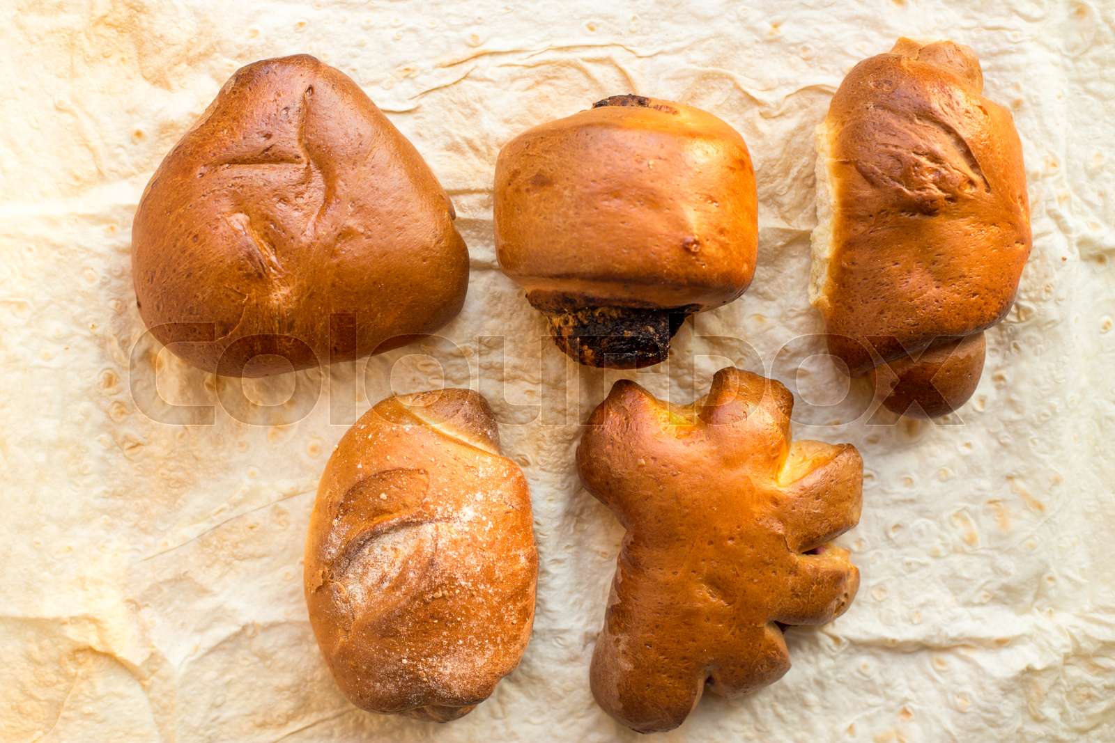 Assortment of healthy buns top view. Five different sweet buns. Not a ...