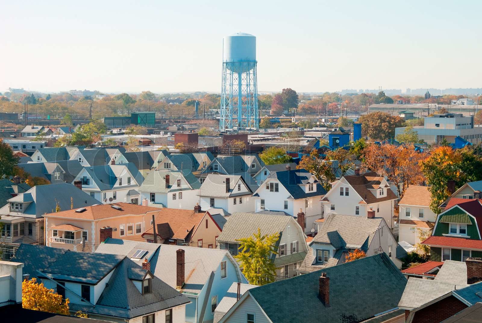 Suburban rooftops and water tower | Stock image | Colourbox