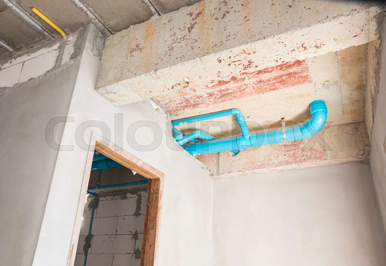 PVC tube in water piping system install under concrete floor in under ...