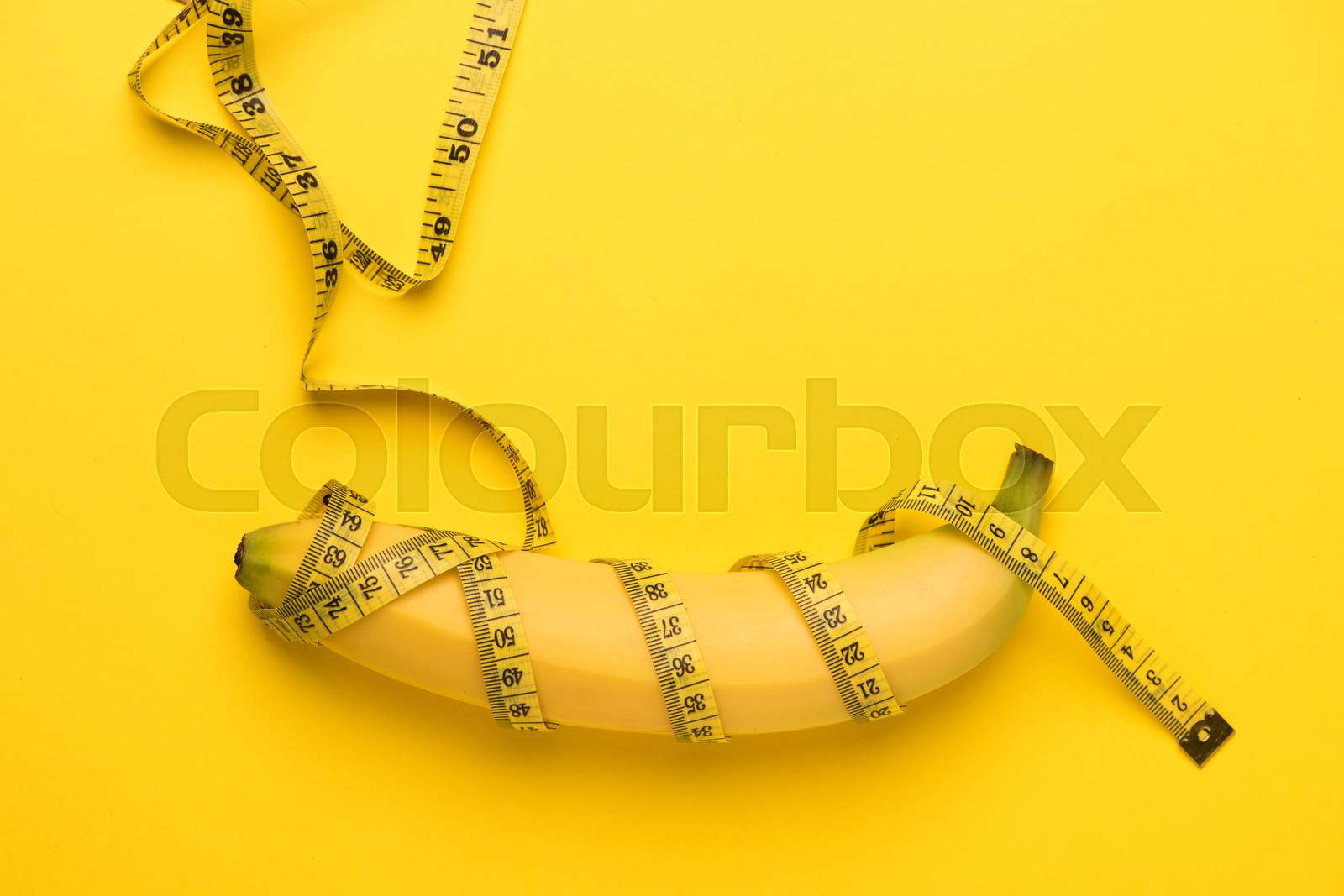 Banana With Tape Measure | Stock image | Colourbox