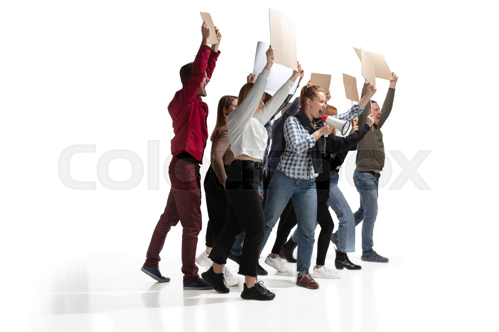 Emotional multicultural group of people screaming while holding blank ...