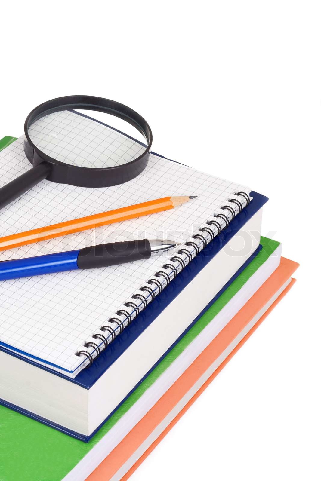 books and pens on white | Stock image | Colourbox