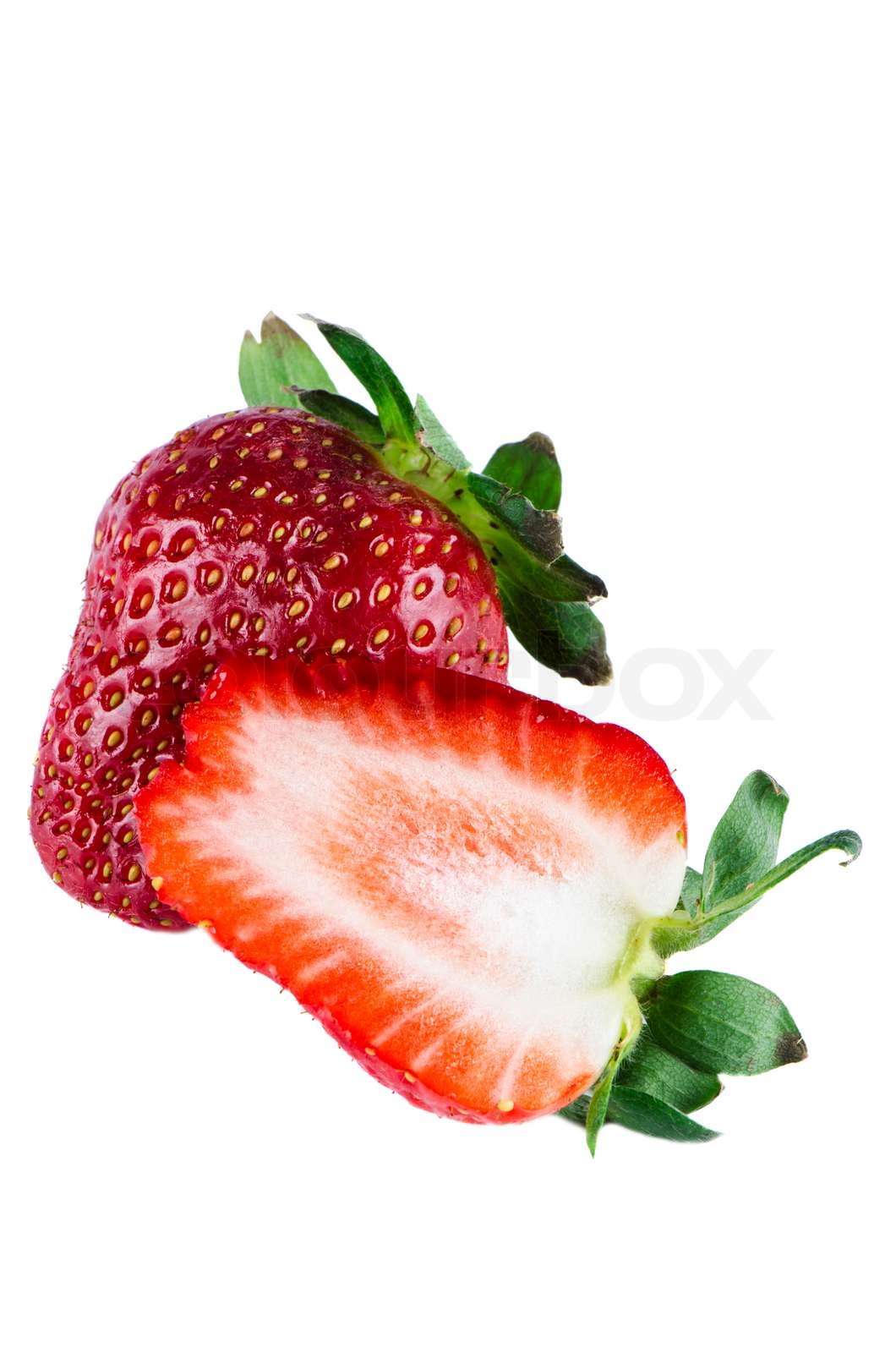 Isolated one and half Strawberries | Stock image | Colourbox