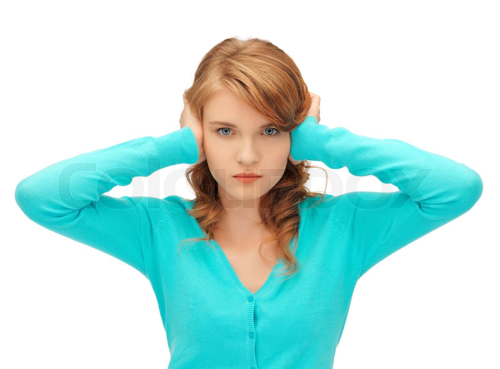 student with hands on ears | Stock image | Colourbox