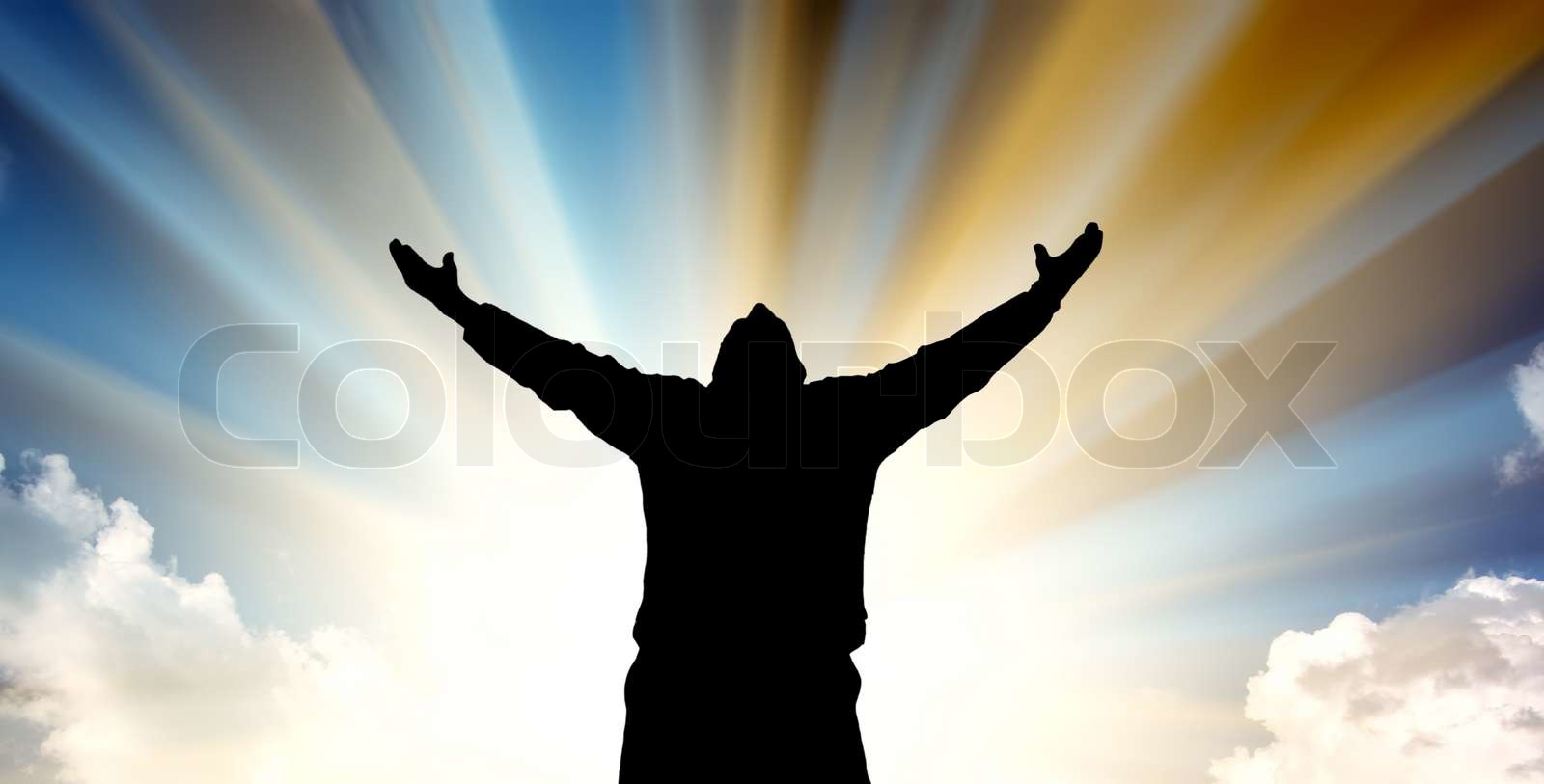 Silhouette of man and sunshine | Stock image | Colourbox
