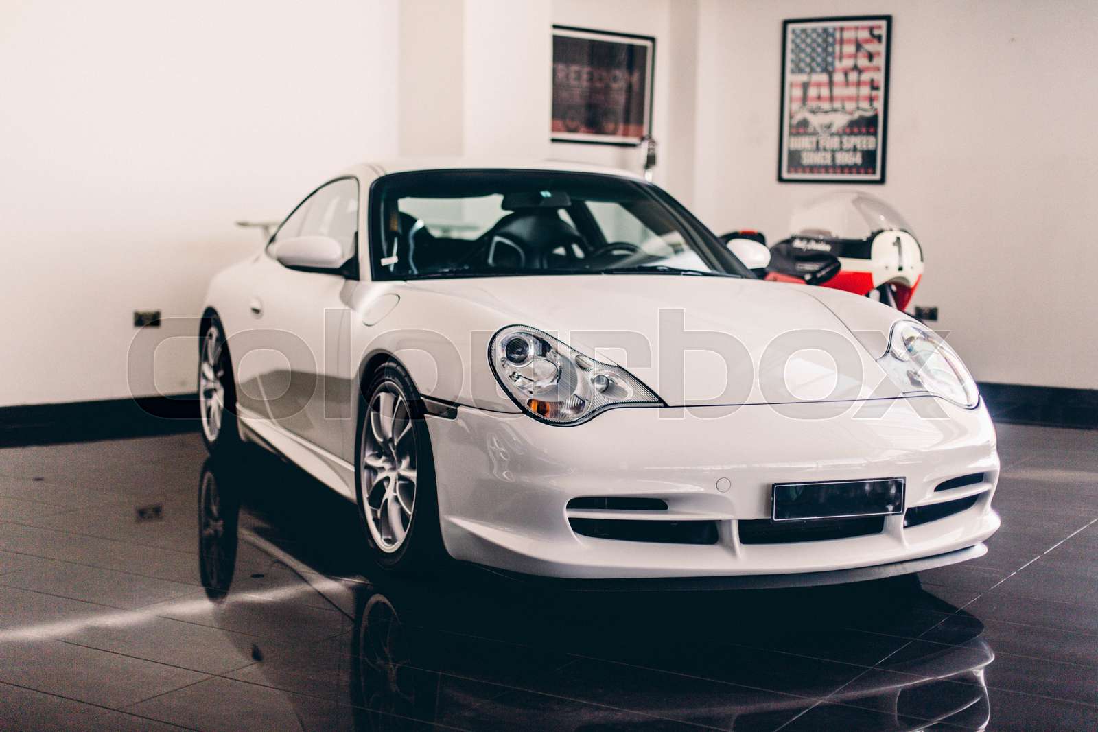 White design sport car in the performance center | Stock image | Colourbox