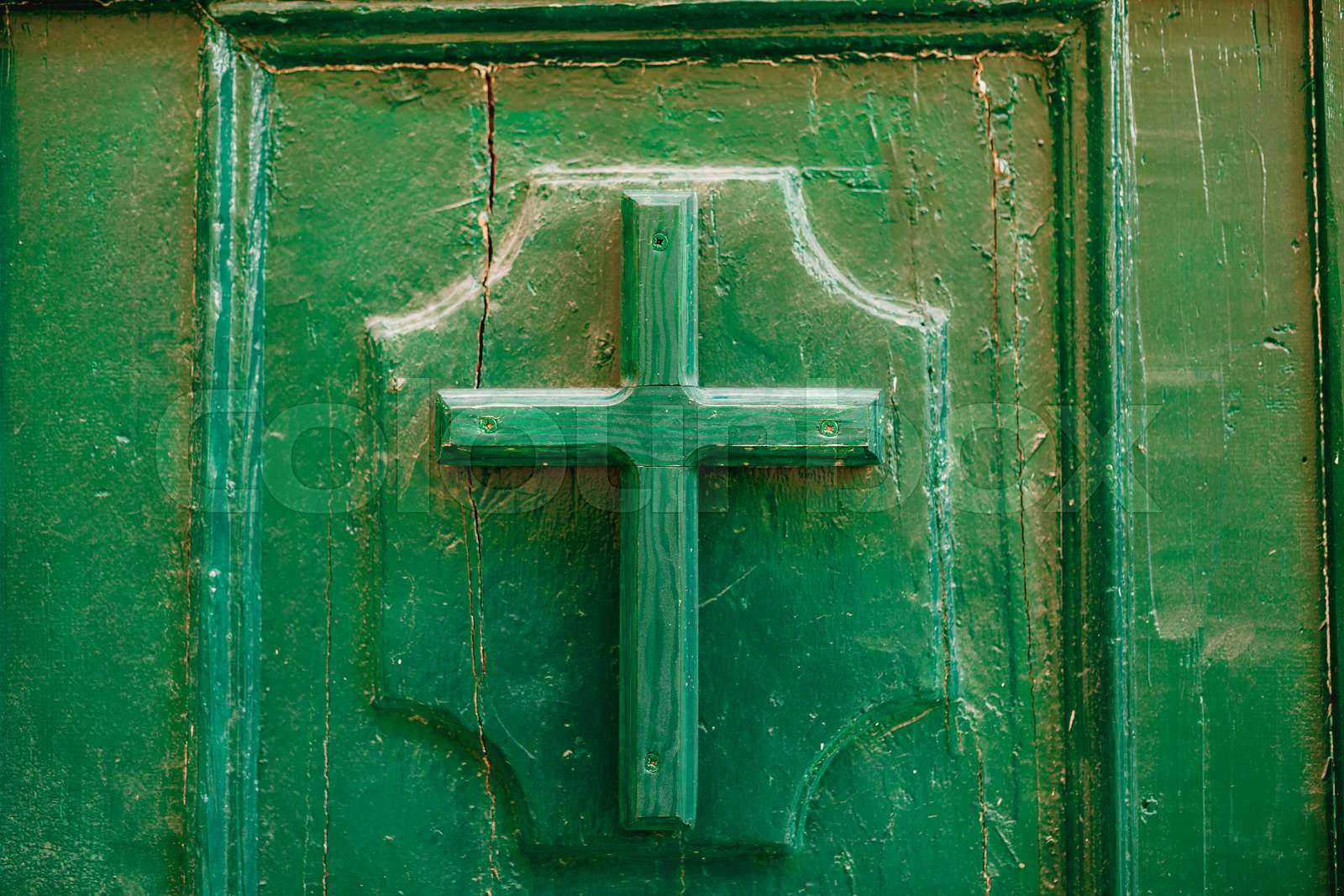 The entrance to the church. Christian cross on the door | Stock image ...
