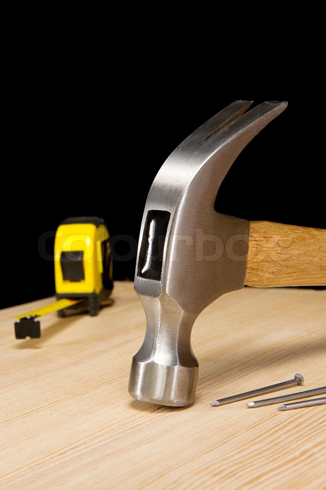 hammer, tape measure and nail | Stock image | Colourbox