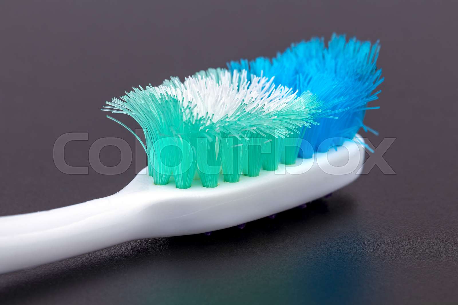 Old unusable worn-out close up toothbrush on black background | Stock ...