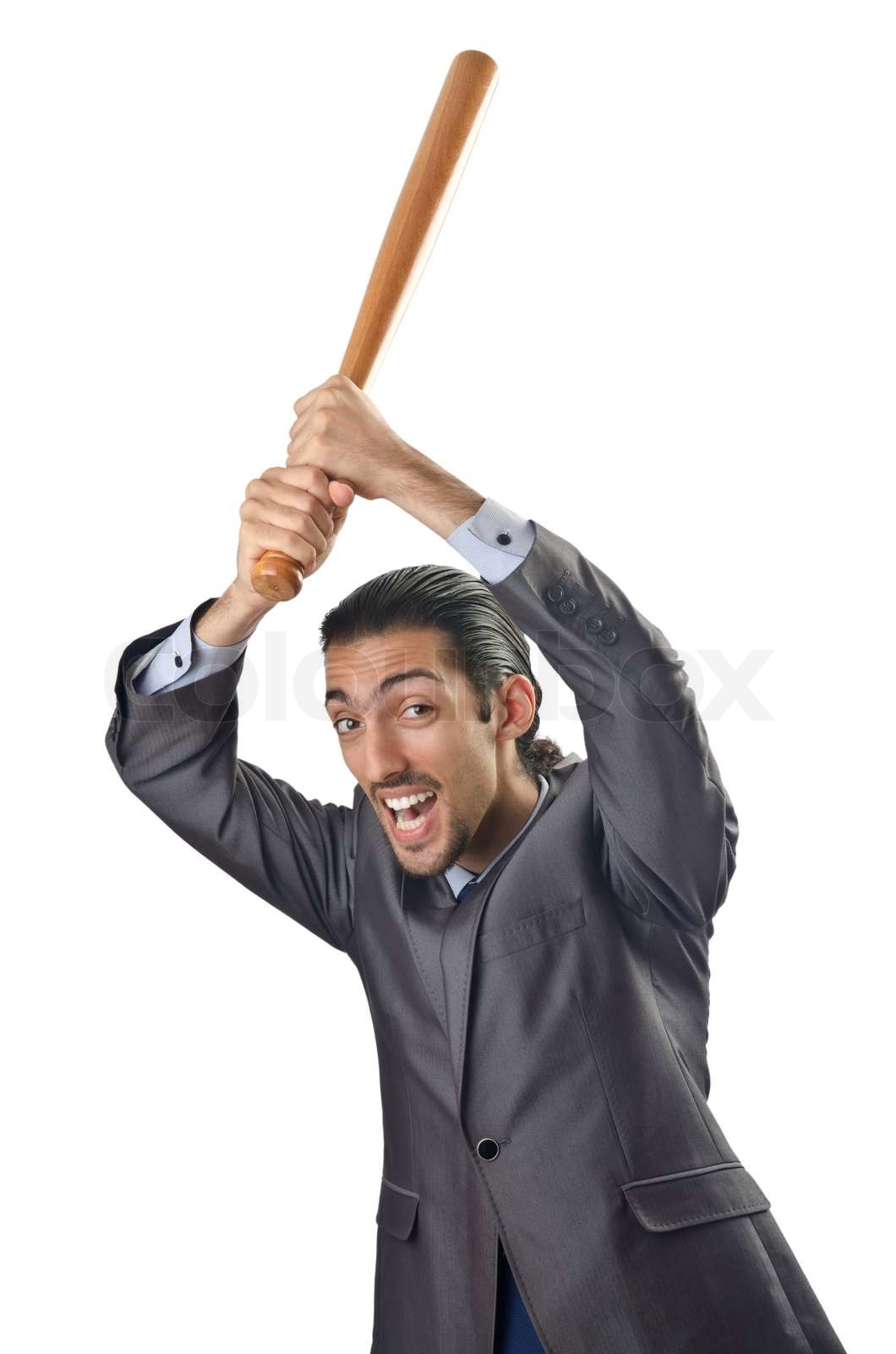 Angry businessman with bat on white | Stock image | Colourbox