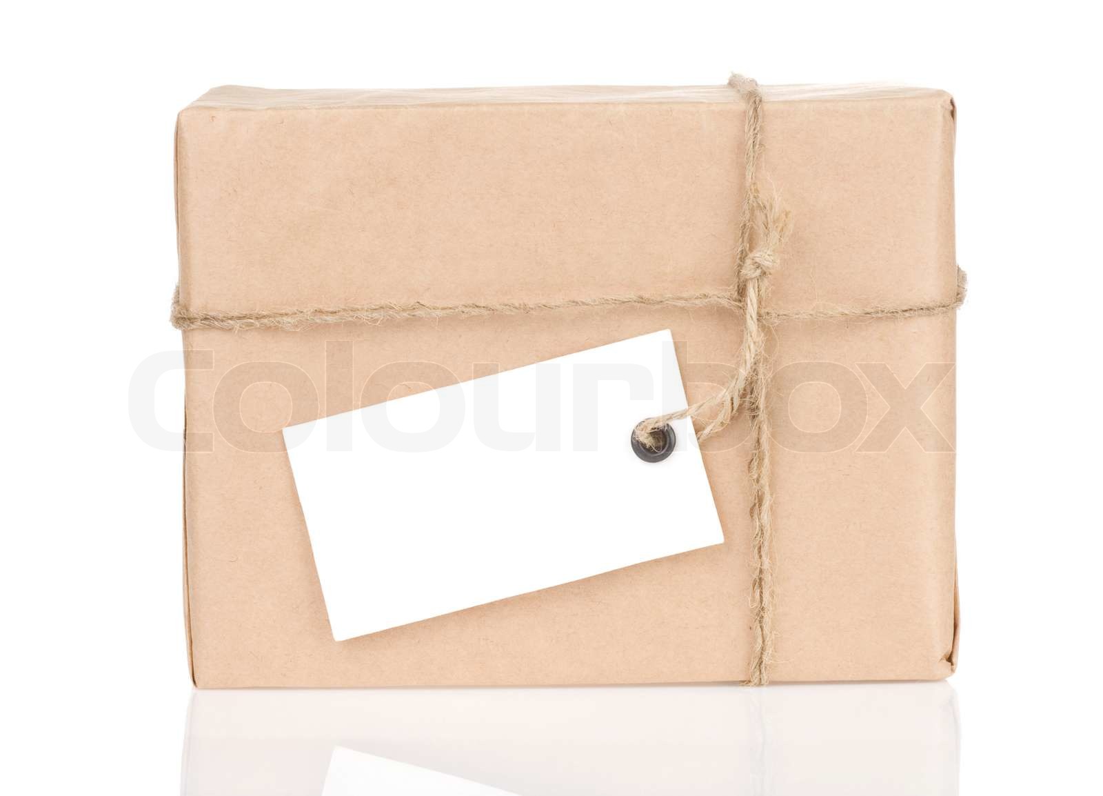 parcel wrapped with rope isolated on white | Stock image | Colourbox
