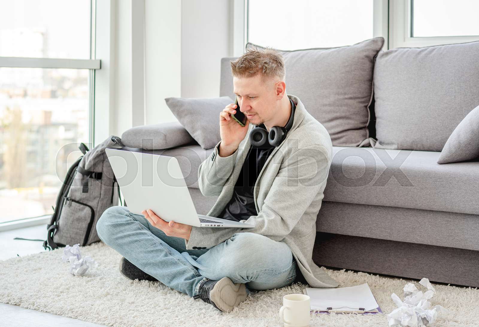 Smiling man working at home | Stock image | Colourbox