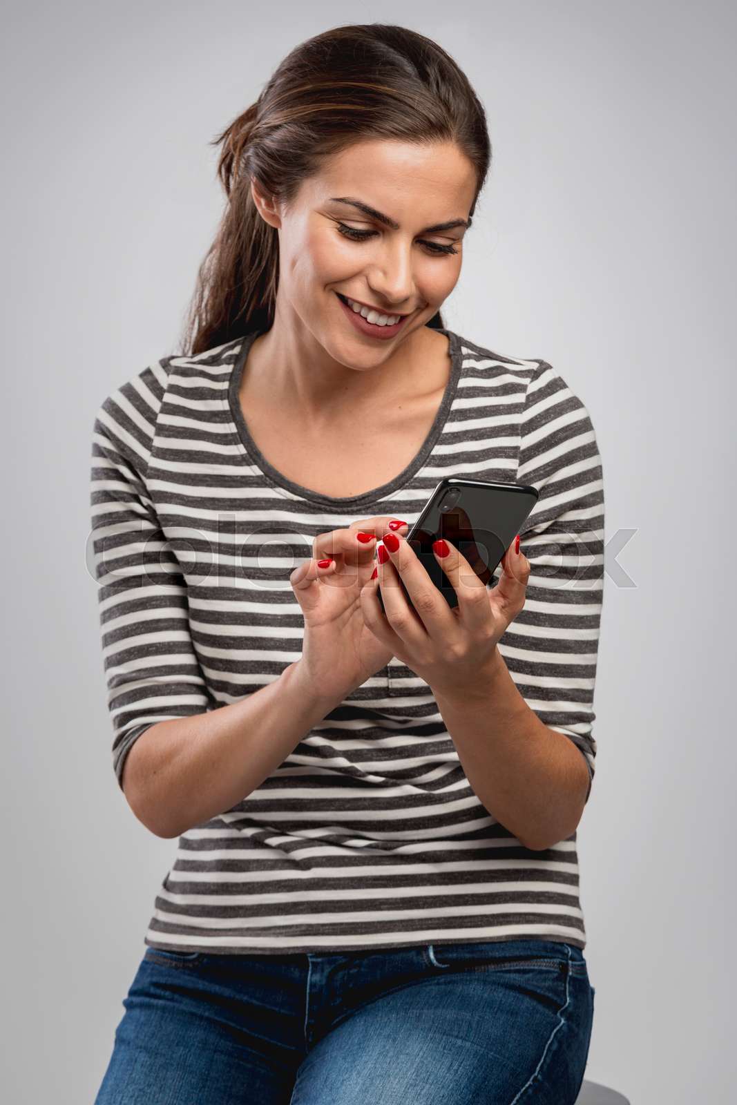 Texting someone | Stock image | Colourbox