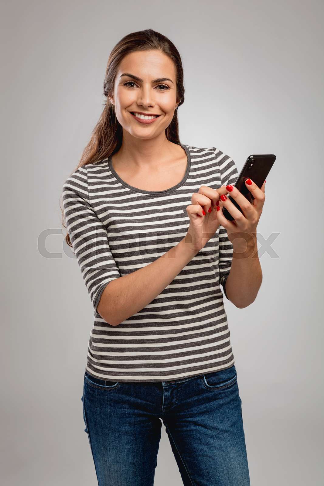 Texting someone | Stock image | Colourbox