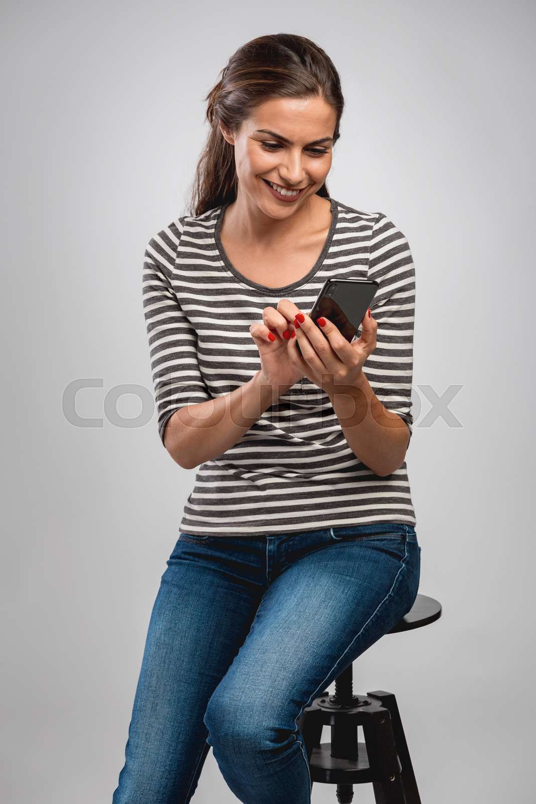 Texting someone | Stock image | Colourbox