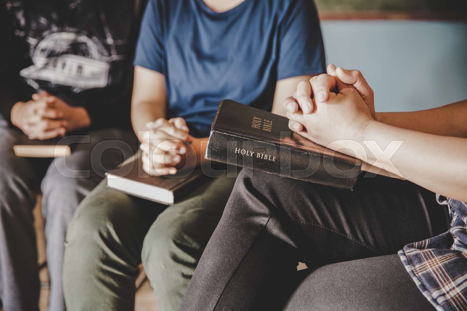 Christian family worship God in home | Stock image | Colourbox