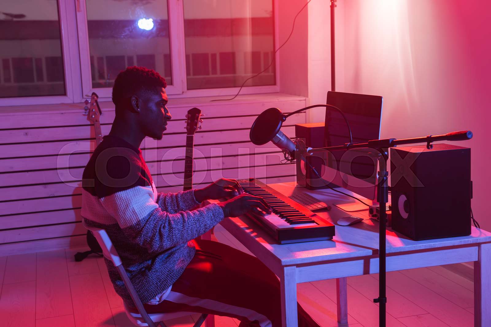 Musician and making music concept - African american male sound ...