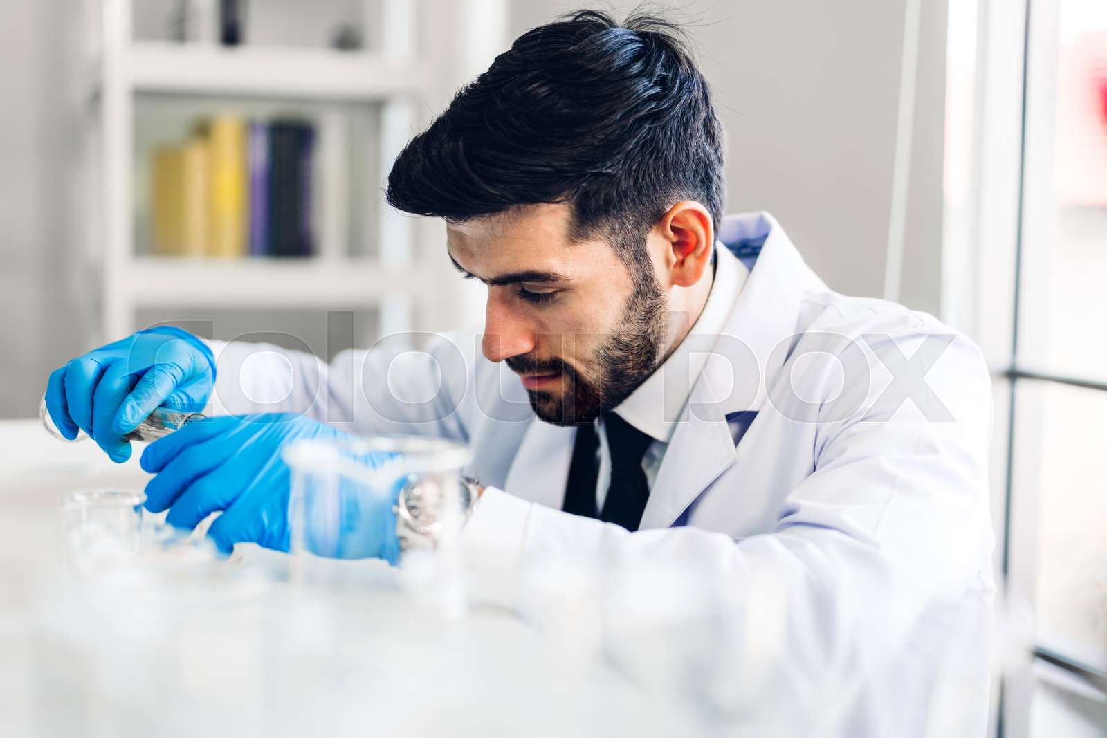 Professional scientist man research and working doing a chemical ...