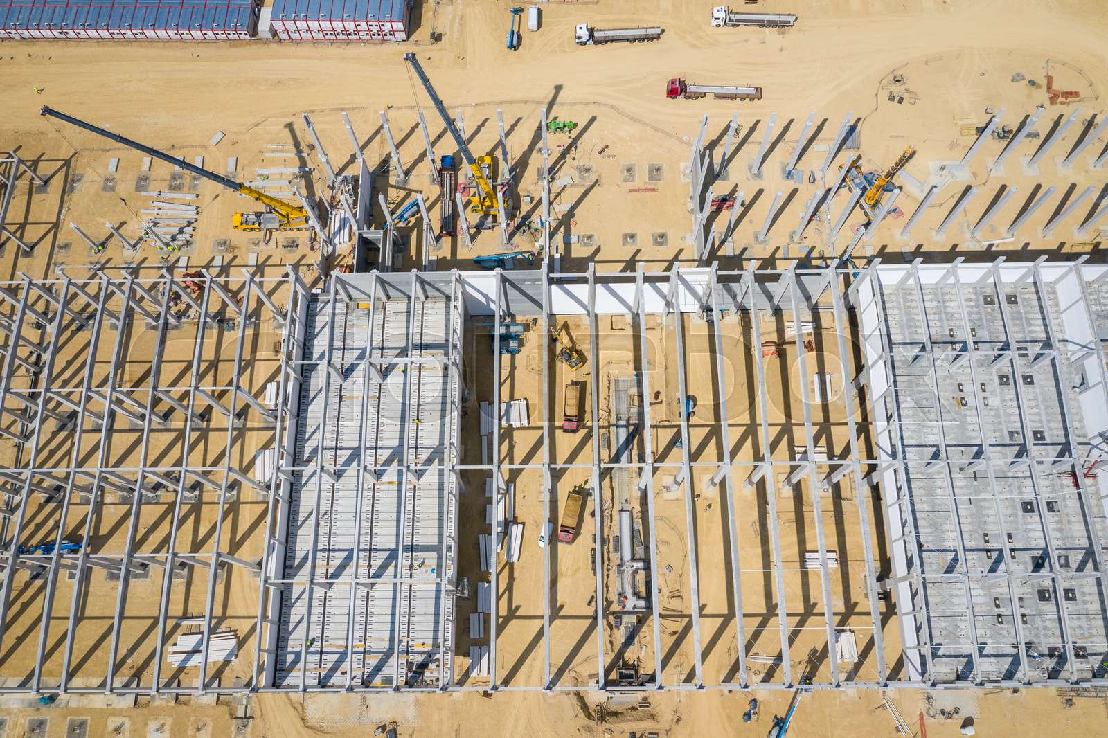 Construction site from above. Top view of factory under construction ...