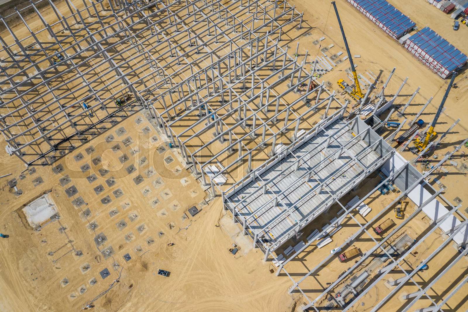 Construction site from above. Top view of factory under construction ...