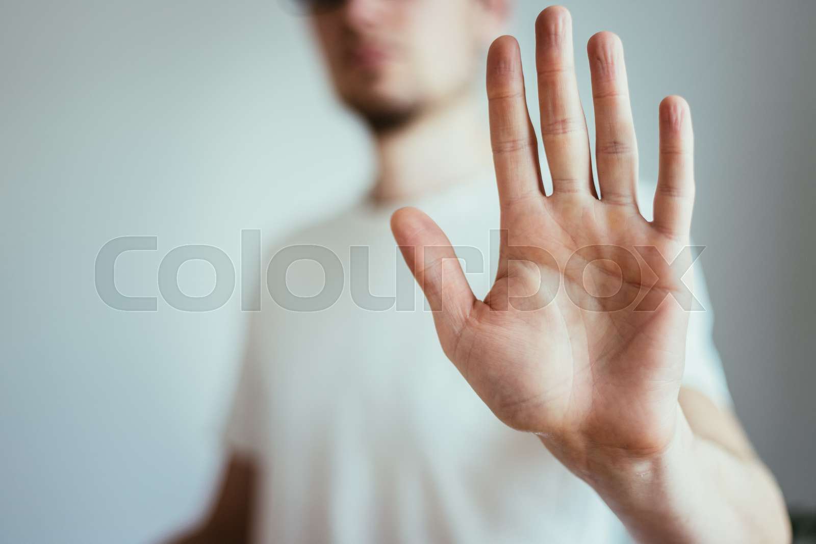 Defense or stop gesture: Male hand with stop gesture | Stock image ...