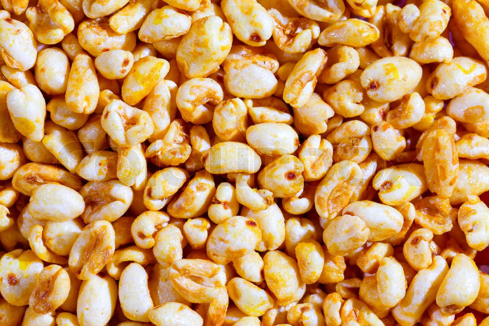 Background with popped wheat grains | Stock image | Colourbox