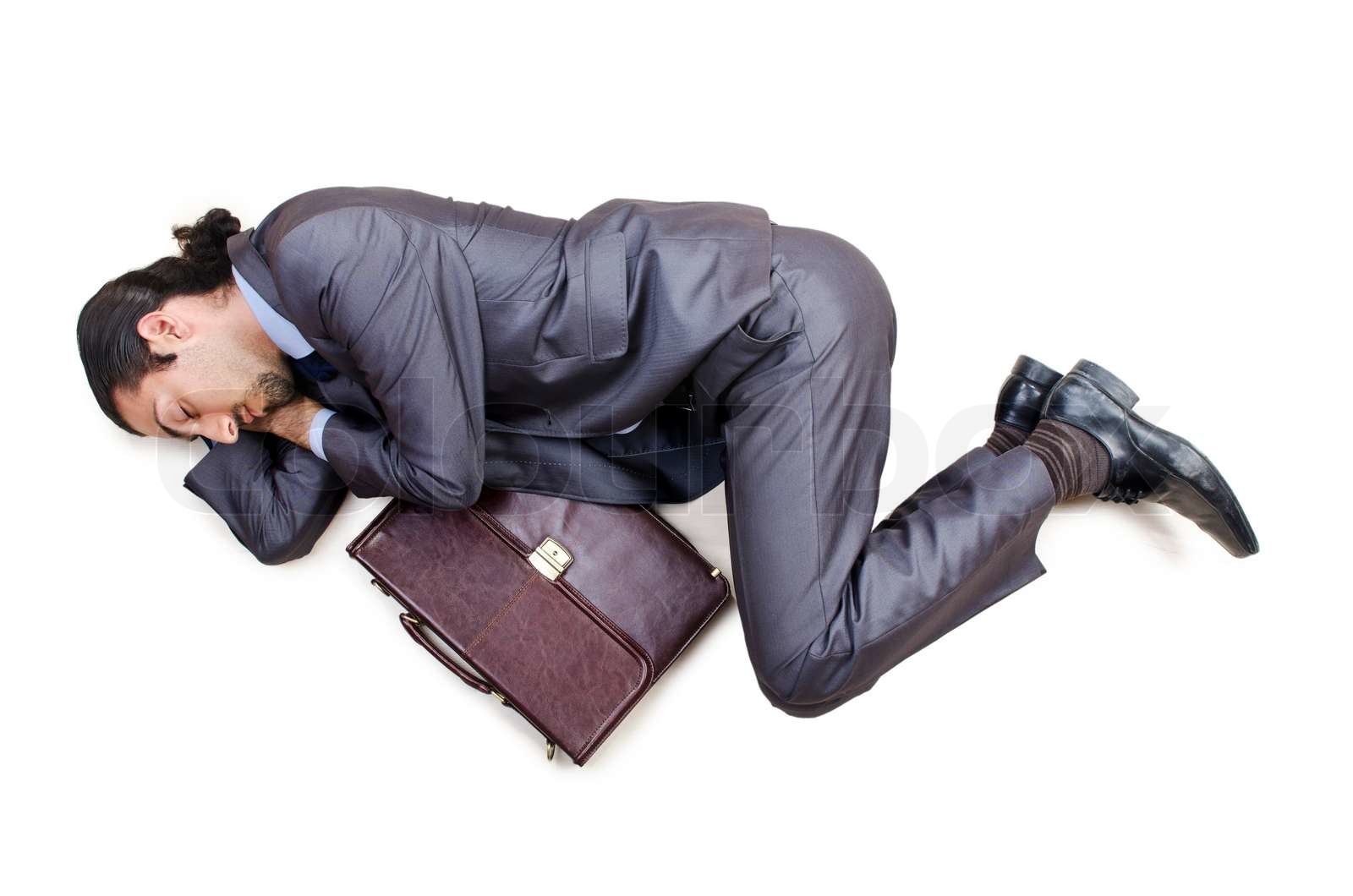 Dead businessman on the floor | Stock image | Colourbox