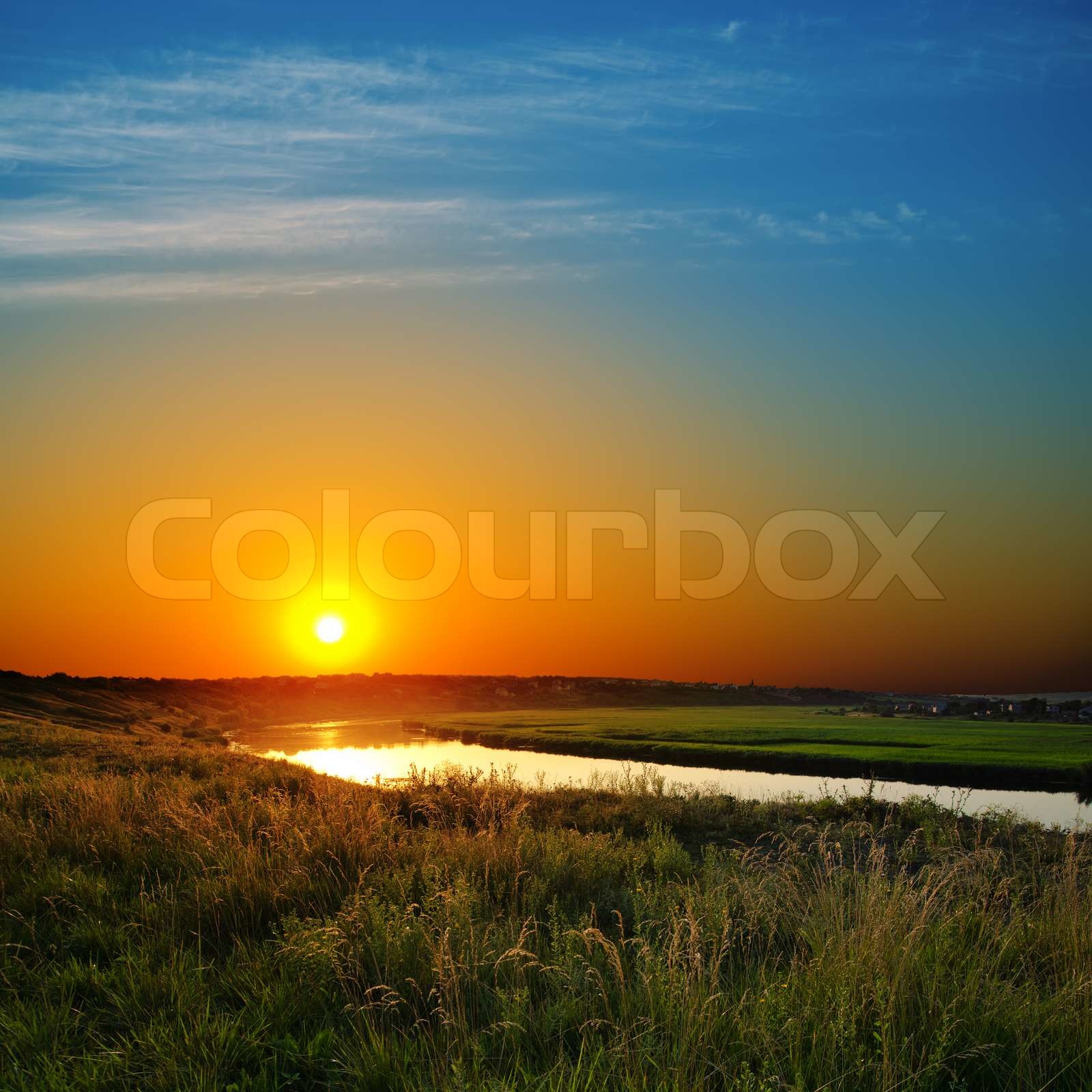 dramatic sunset over river | Stock image | Colourbox