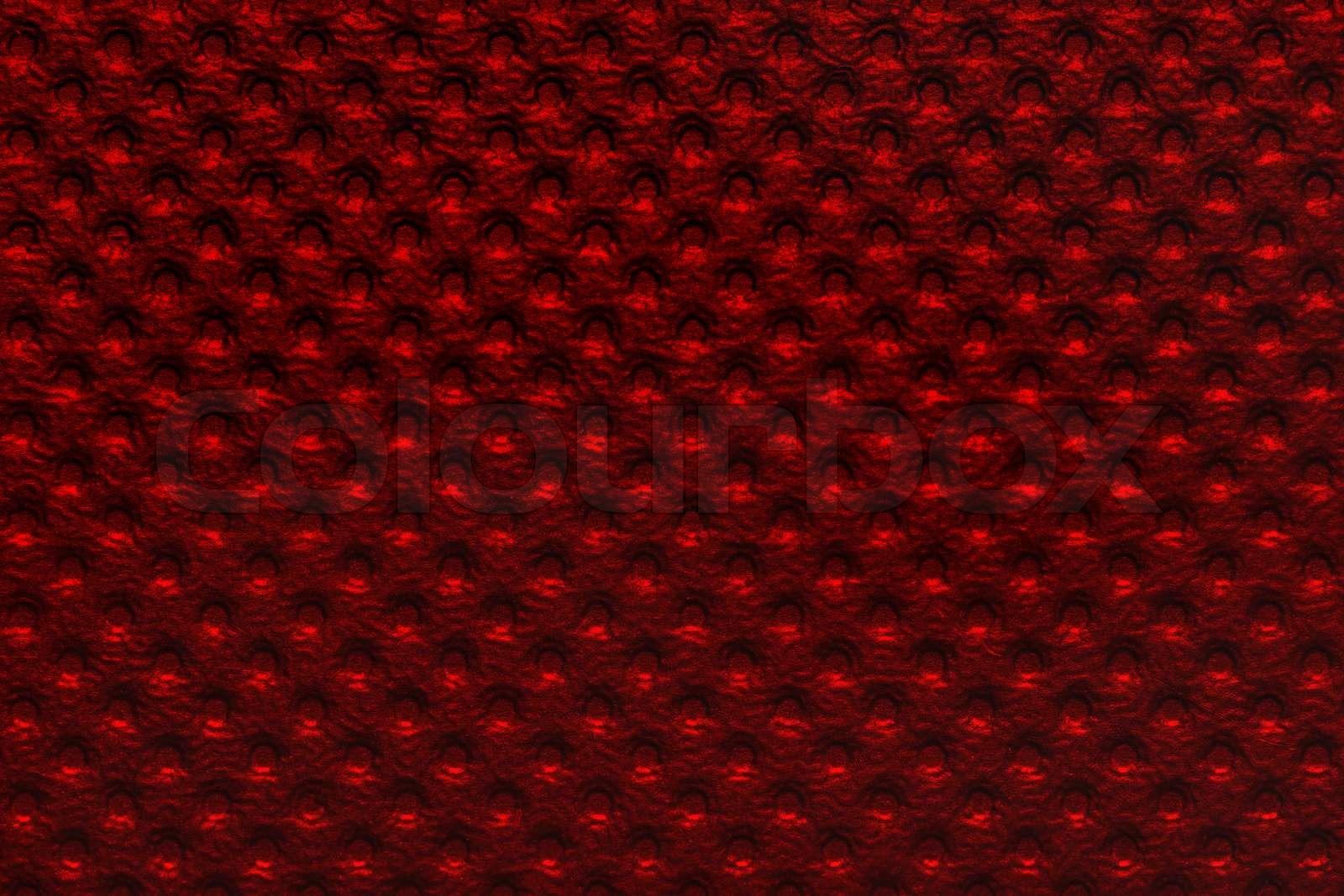 Dunkelrot perforiert Kunststoff Hintergrund | Stock Bild | Colourbox