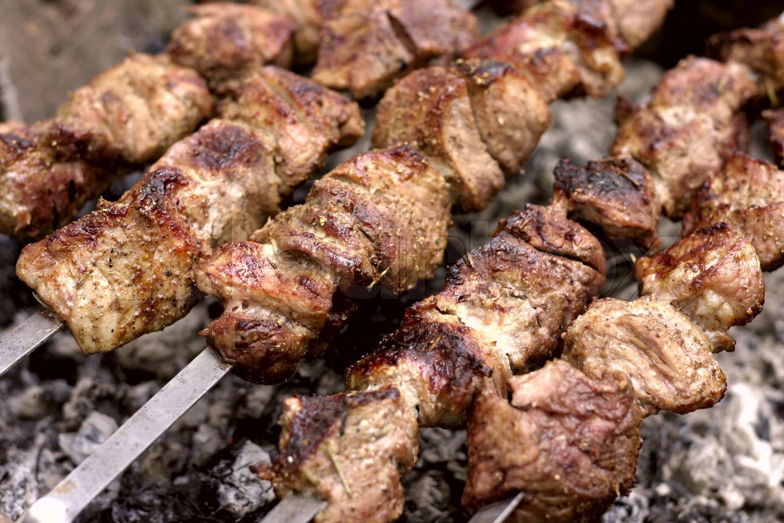 Insanely delicious kebab prepares on the fire outdoors | Stock image ...