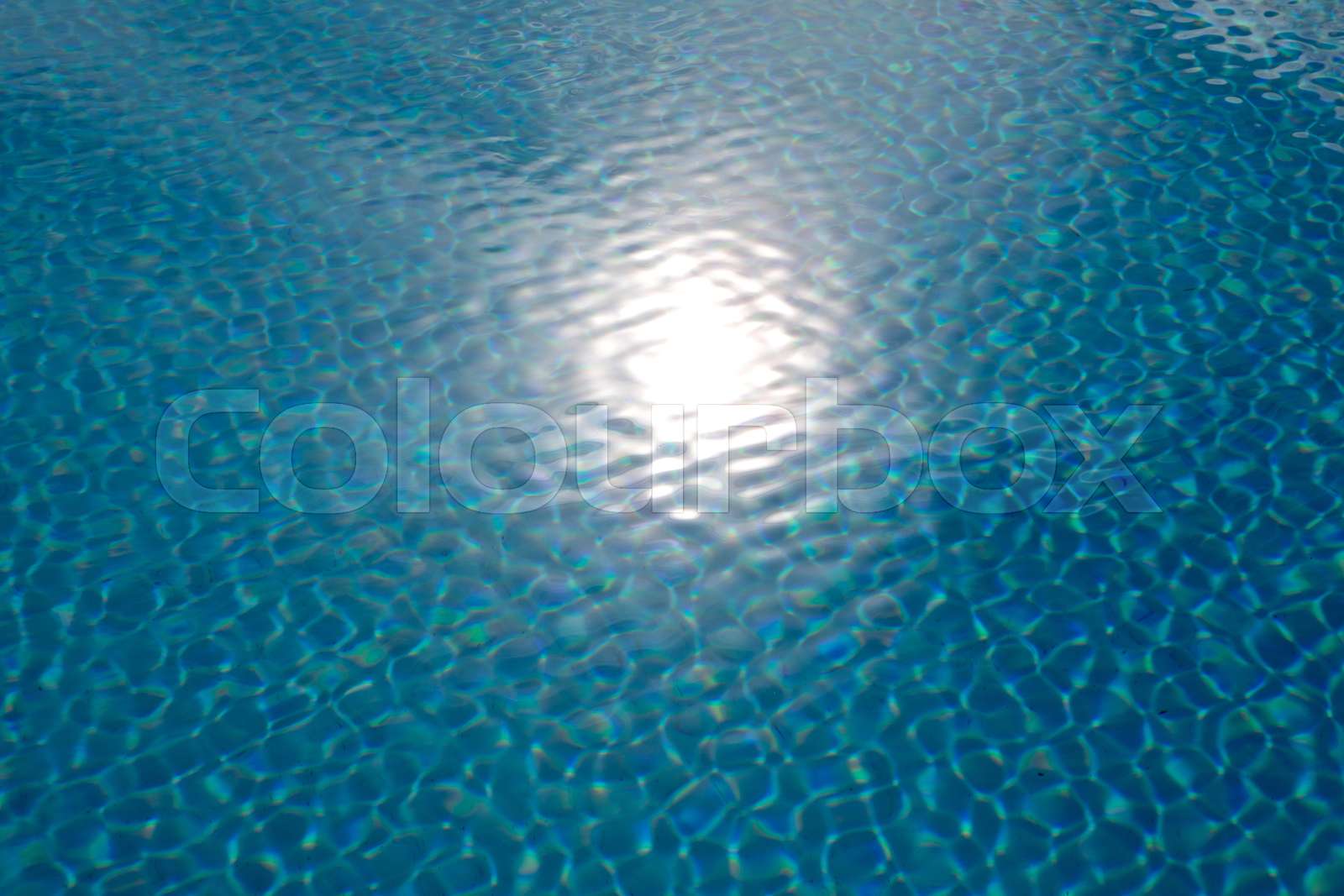 Blue and crystalline water of a swimming pool | Stock image | Colourbox