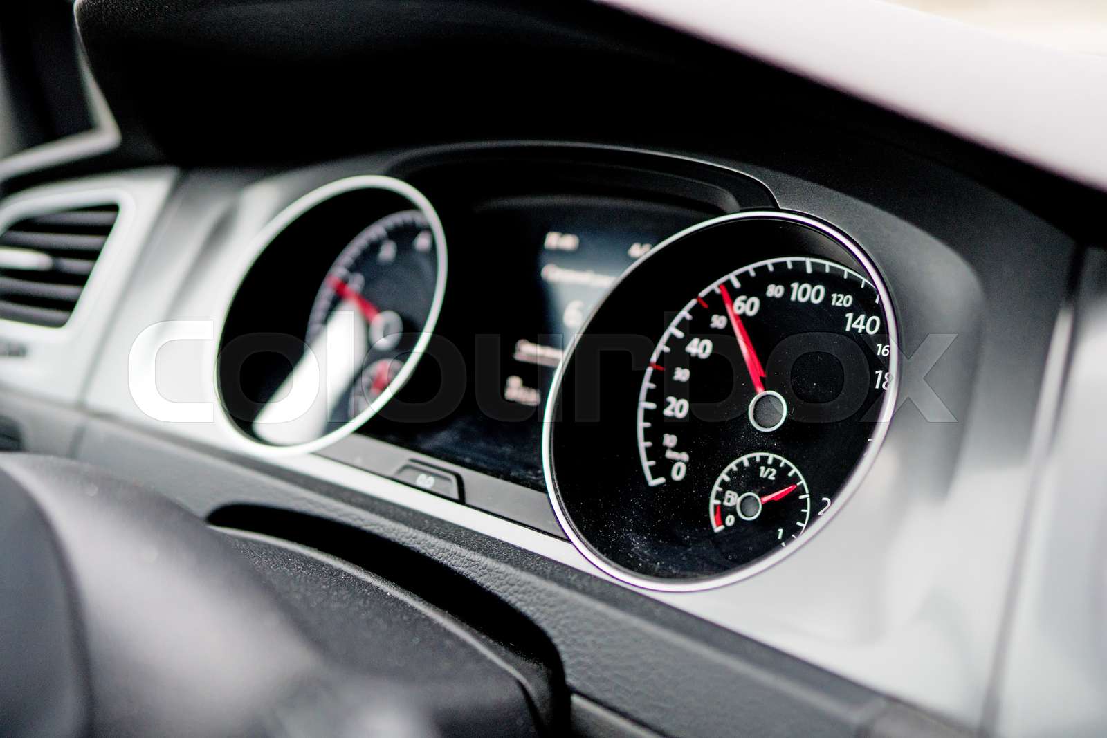Electronic speed dashboard inside of modern car. | Stock image | Colourbox