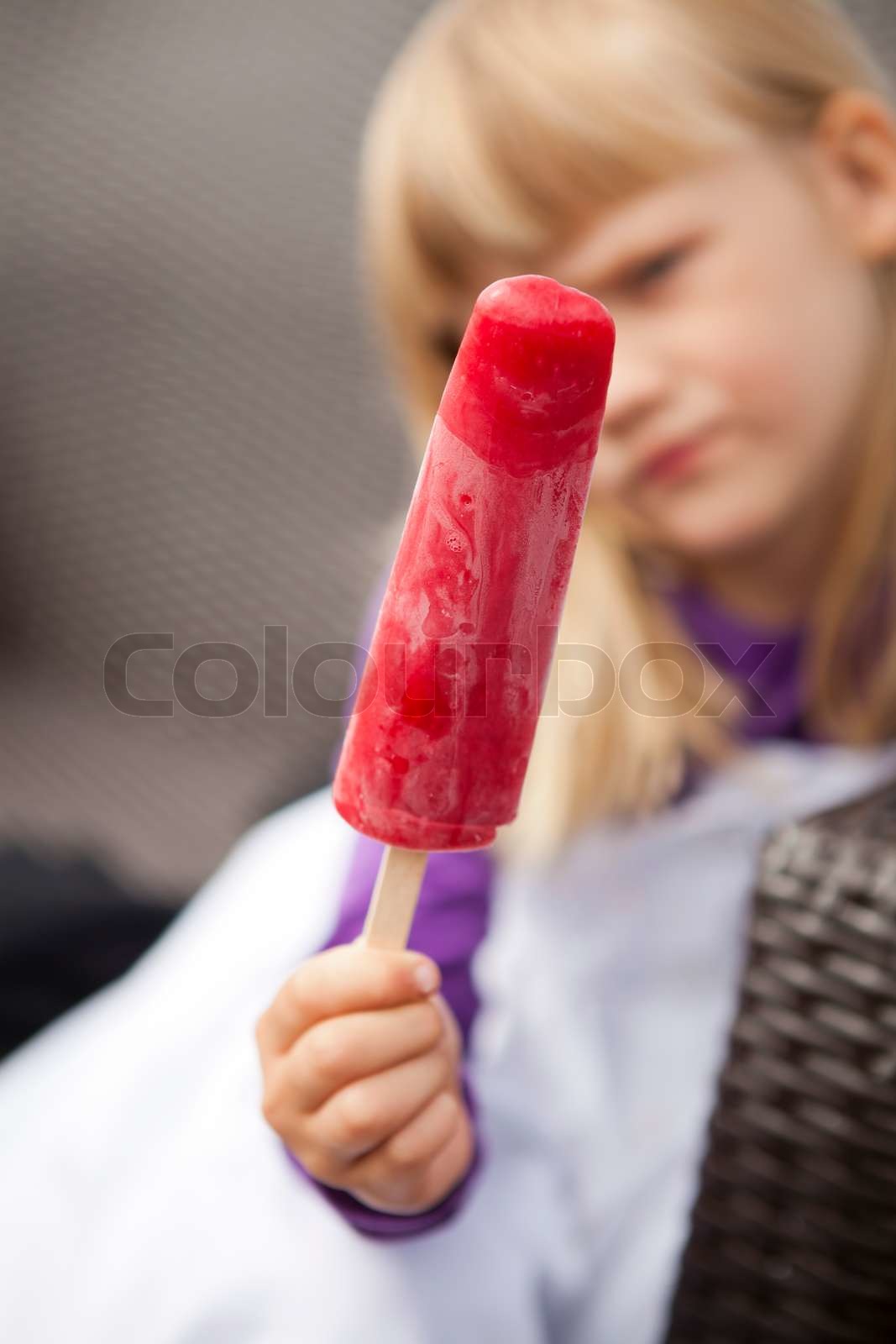 Girl with popsicle | Stock image | Colourbox