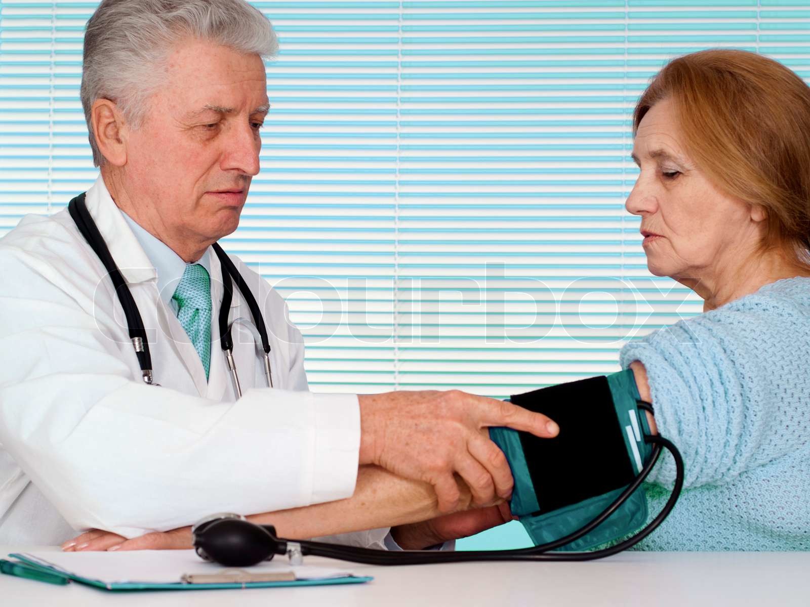Caucasian aged doctor with a elderly patient | Stock image | Colourbox