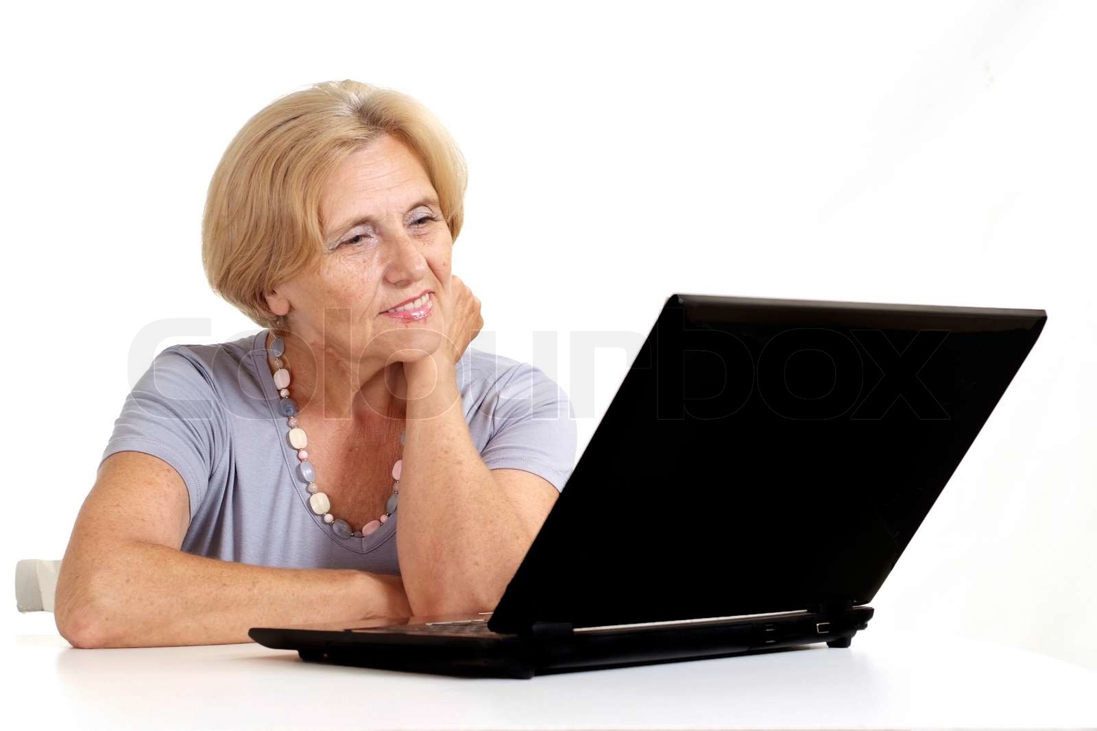 Fine old lady at home | Stock image | Colourbox