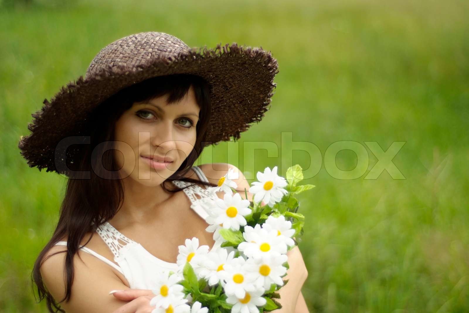 Interesting girl with a sweet expression on face | Stock image | Colourbox