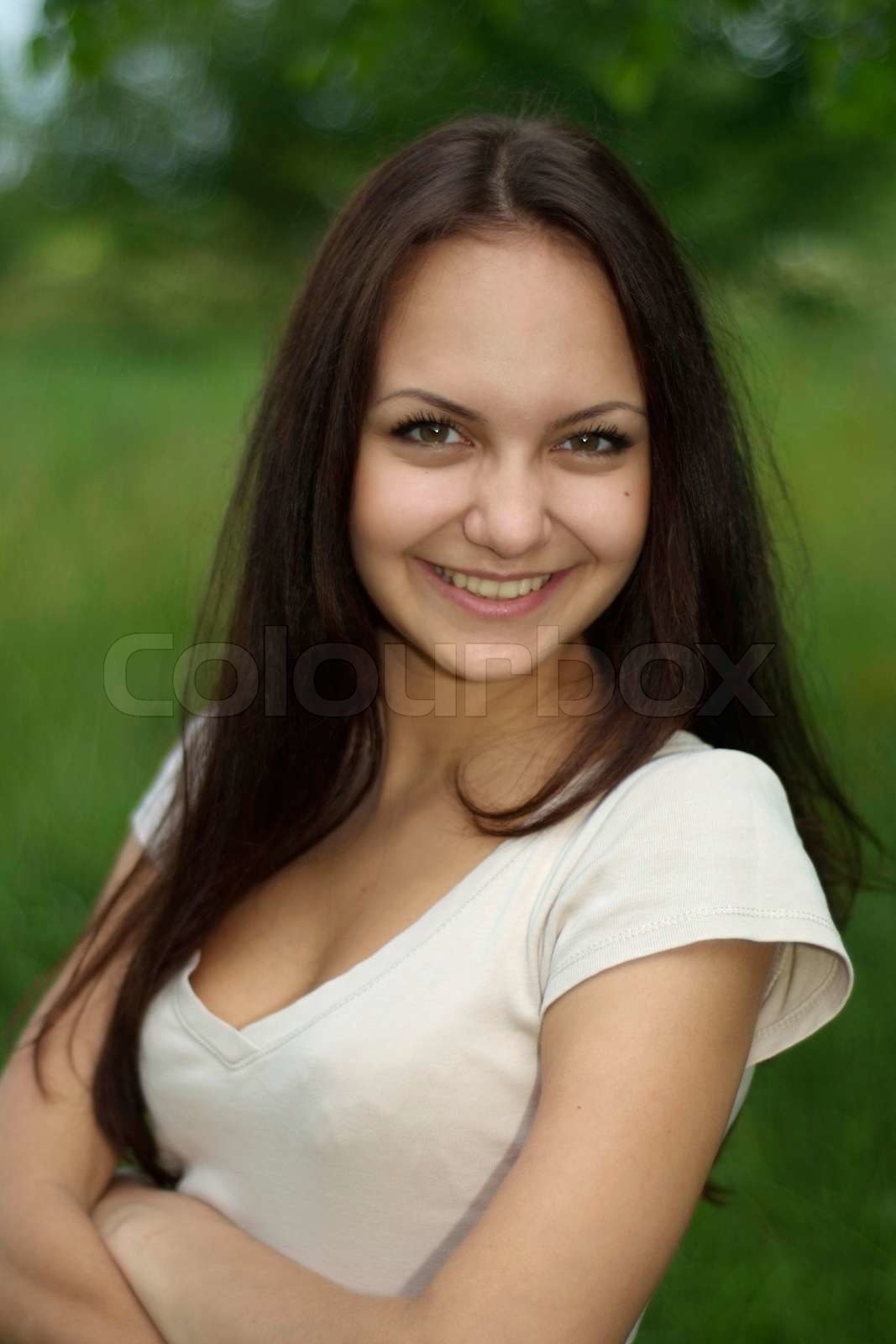 Elegant lady with a sweet expression on face | Stock image | Colourbox