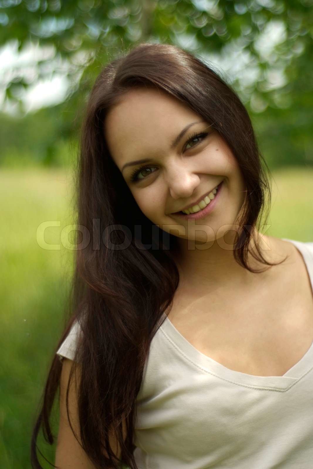 Friendly lady with a sweet expression on face | Stock image | Colourbox