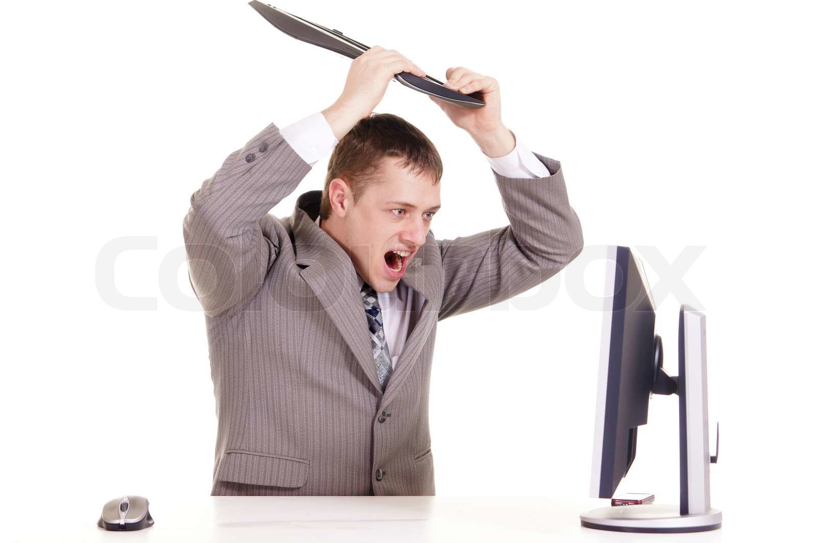 businessman sitting at a computer | Stock image | Colourbox