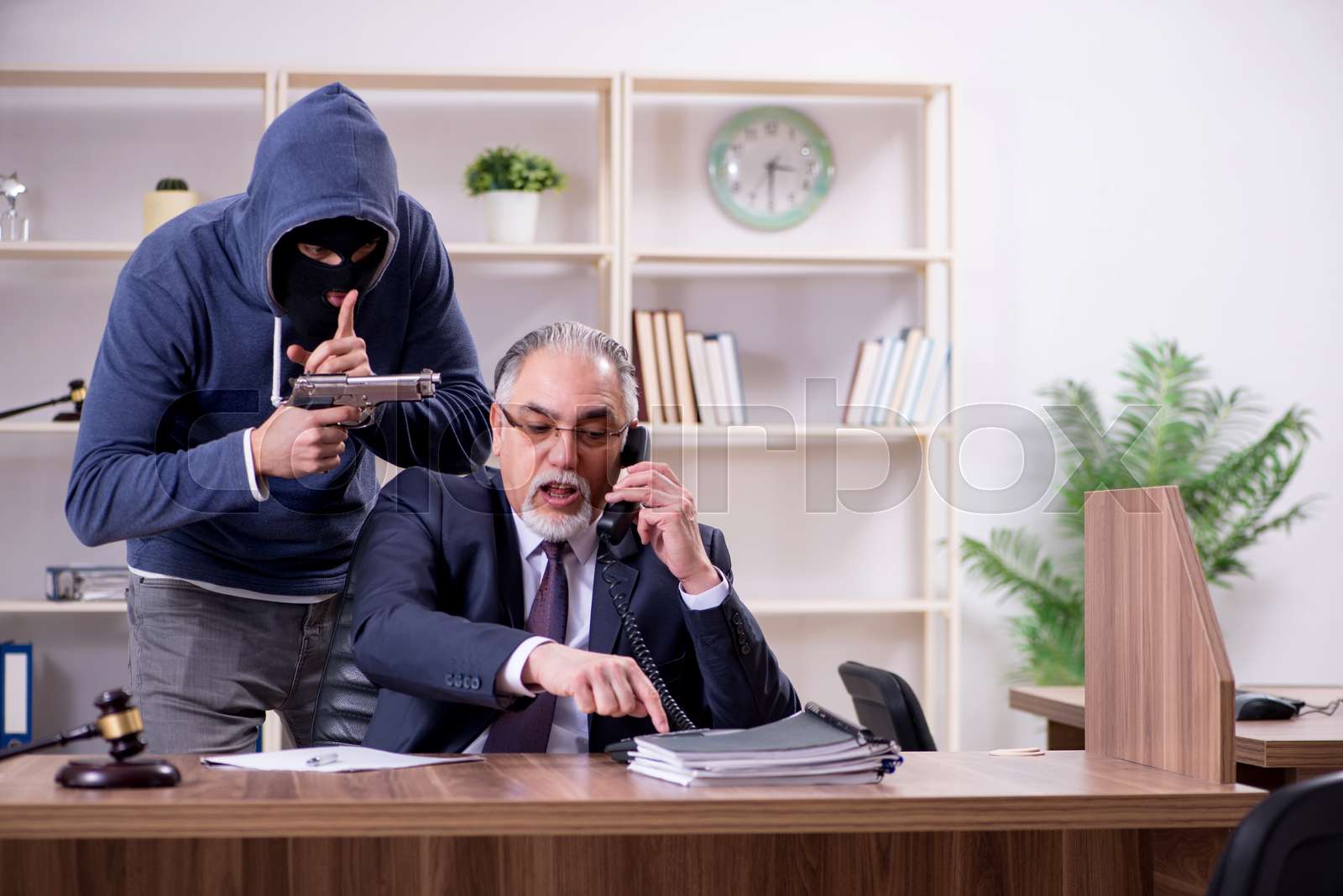 Young mobster threatening old judge | Stock image | Colourbox