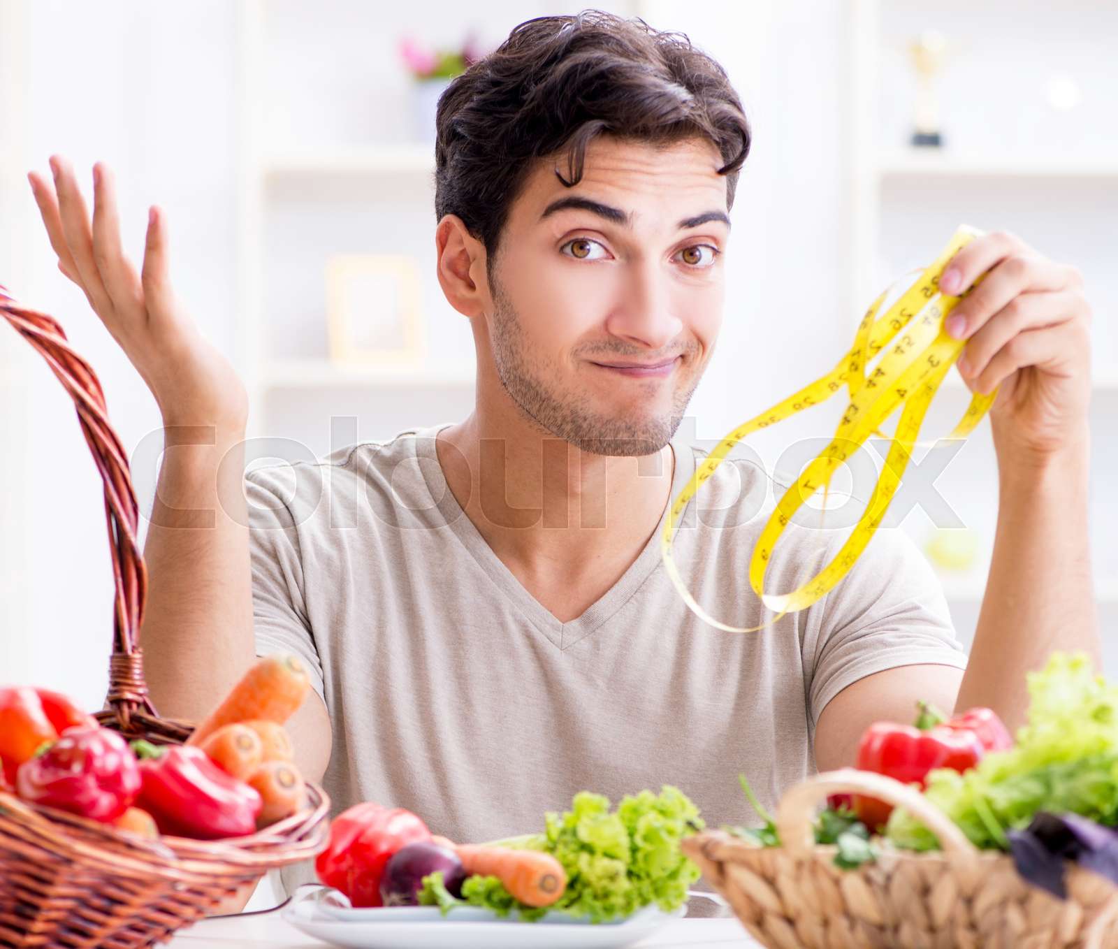 Young man in healthy eating and dieting concept | Stock image | Colourbox