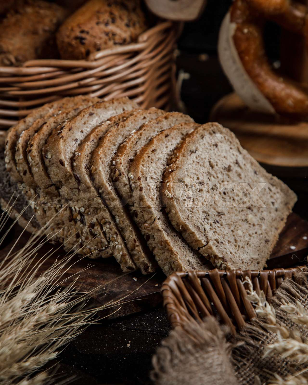 Sliced gray bread coated with grains | Stock image | Colourbox