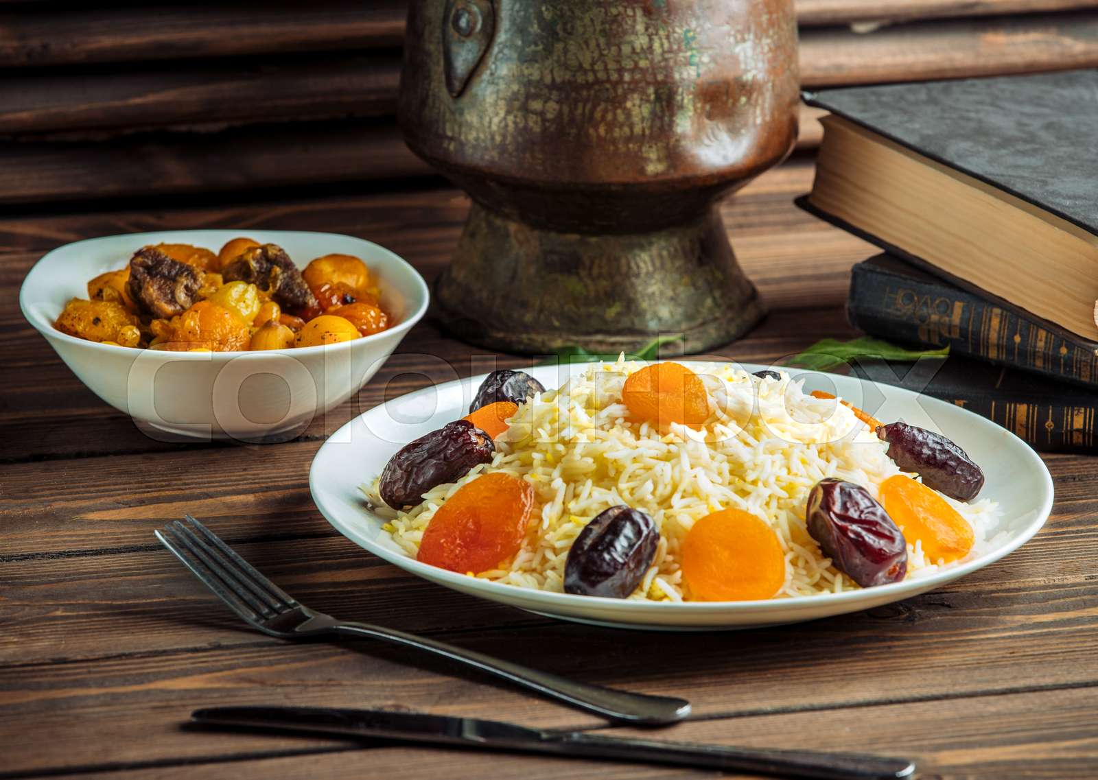 plate of azerbaijani pilaf rice served with dried fruits and roasted ...