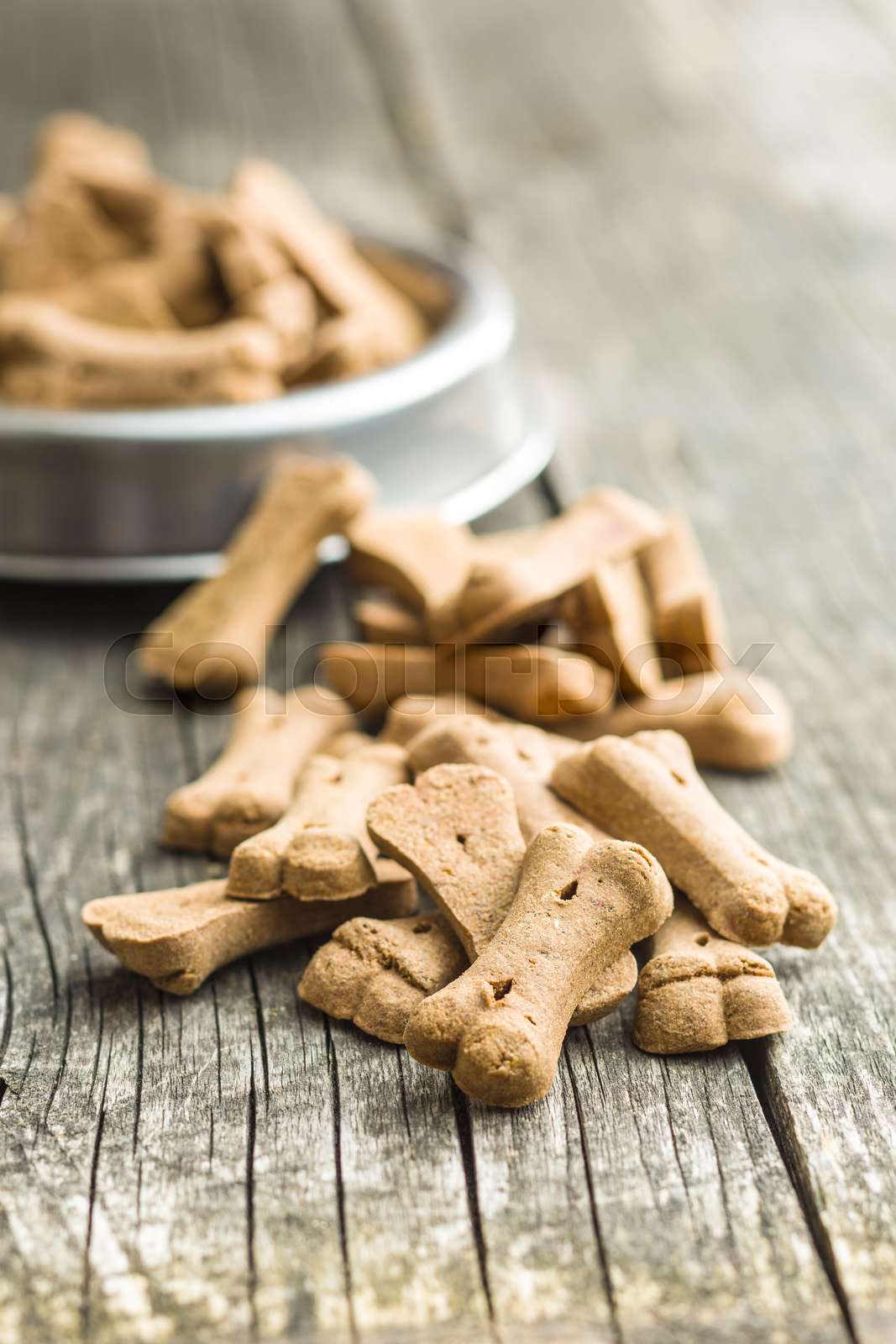 Dog food shaped like bones. | Stock image | Colourbox