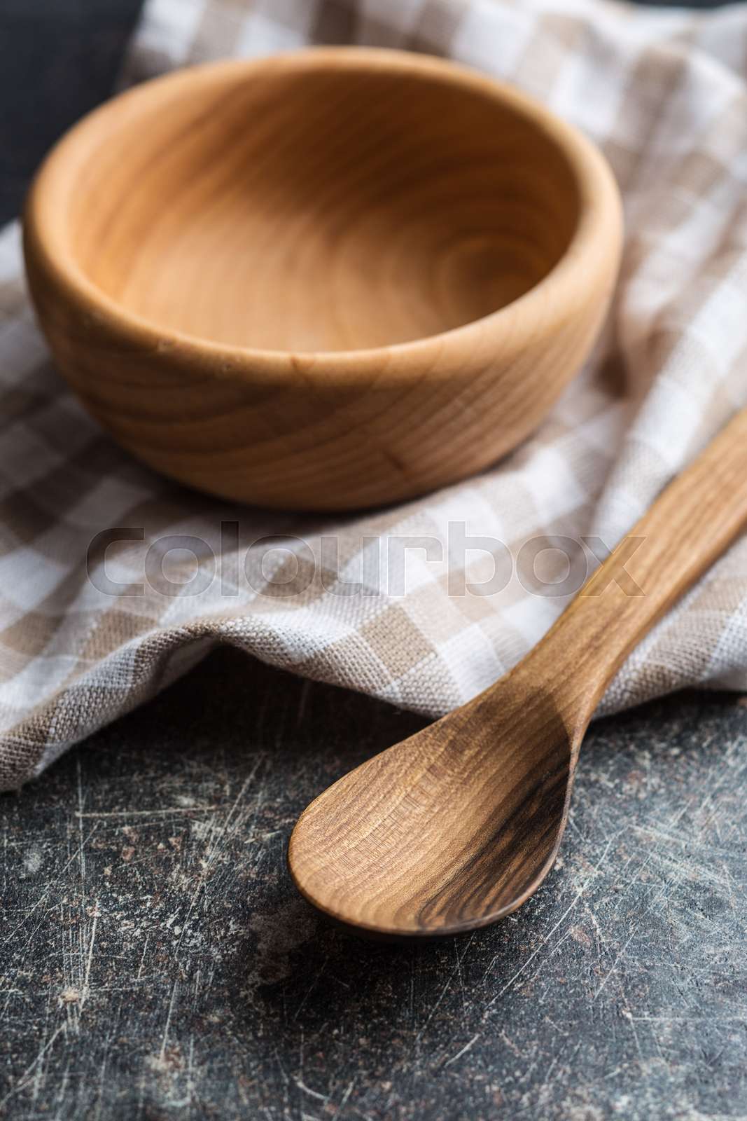 Wooden spoon and bowl. | Stock image | Colourbox