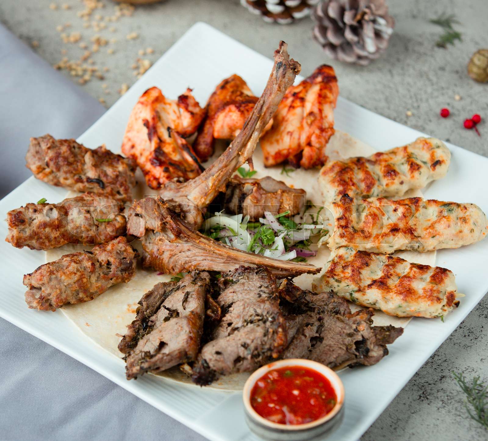 azeri kebab is served with lula kabab and ketchup in the plate | Stock ...