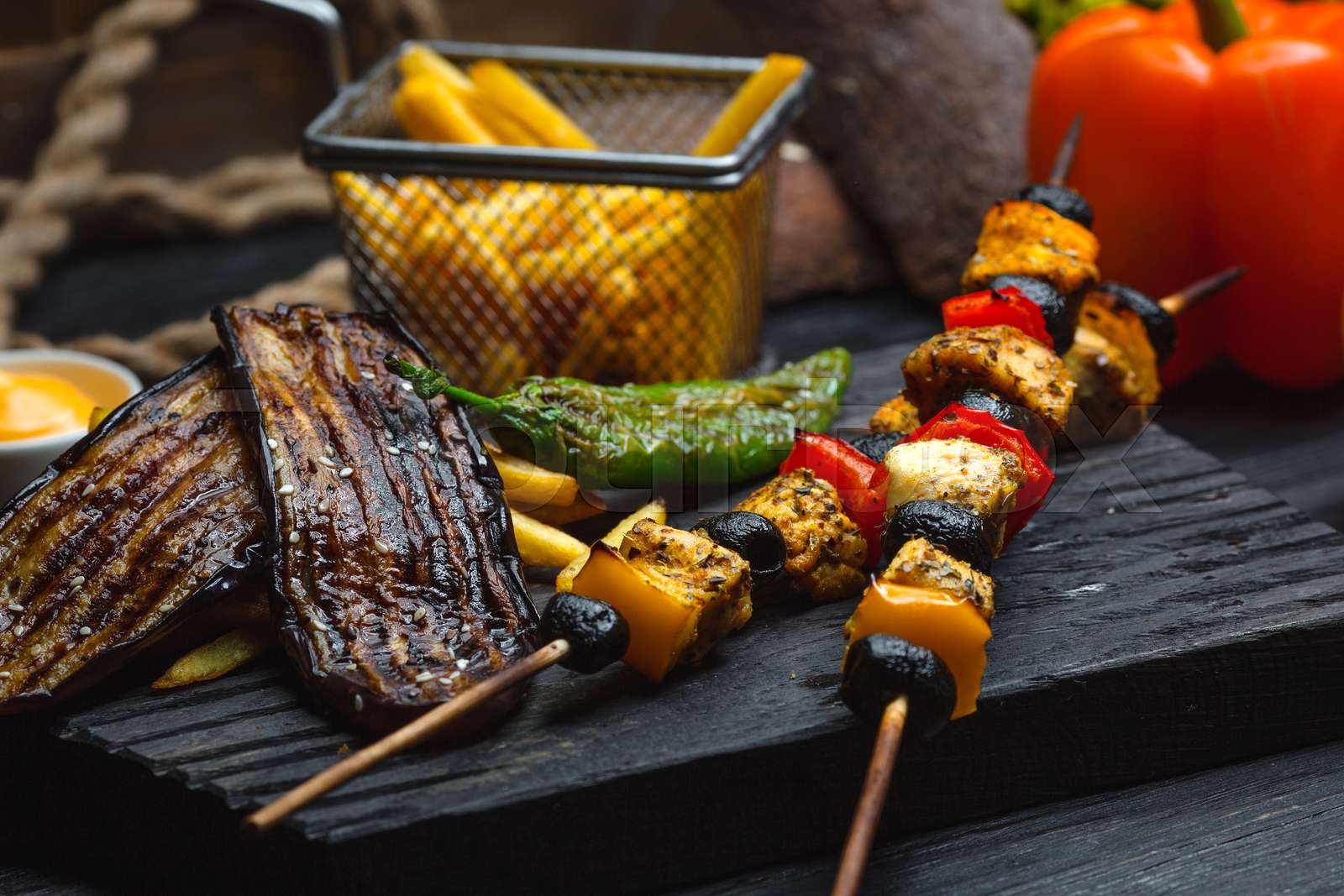 chicken kebab with french fries and vegetables | Stock image | Colourbox